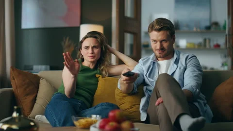 Relaxed partners chilling sofa watching ... | Stock Video | Pond5