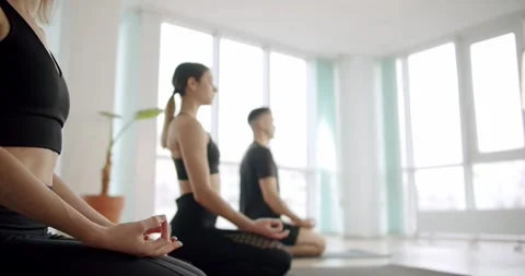 Relaxing after group exercises in class ... | Stock Video | Pond5