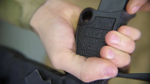 Gun Reload Stock Video Footage | Royalty Free Gun Reload Videos | Pond5