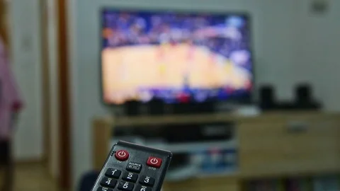 Remote control with flat screen tv on th... | Stock Video | Pond5