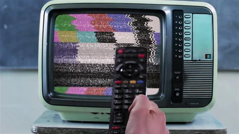Remote Control Turning On an Old TV With... | Stock Video | Pond5