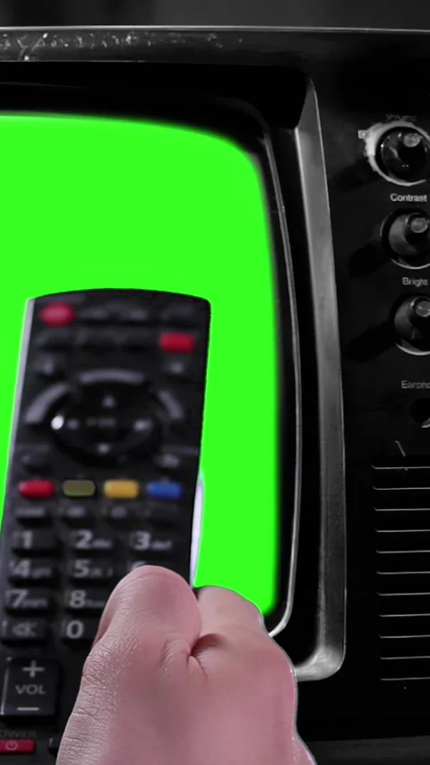 Remote Control Turning On Old TV with Gr... | Stock Video | Pond5