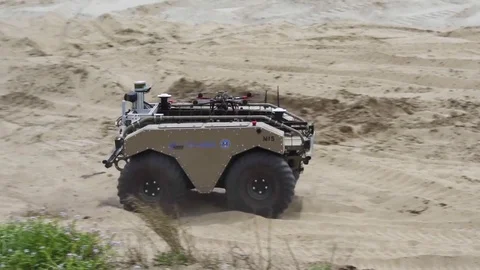 A remote controlled tank carries a small... | Stock Video | Pond5