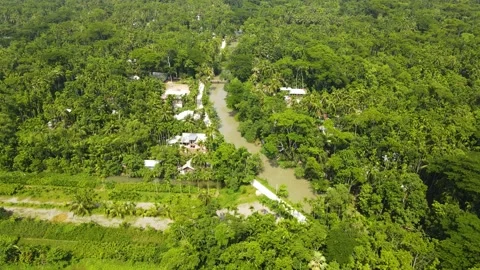 Remote indigenous tribe huts African rai... | Stock Video | Pond5