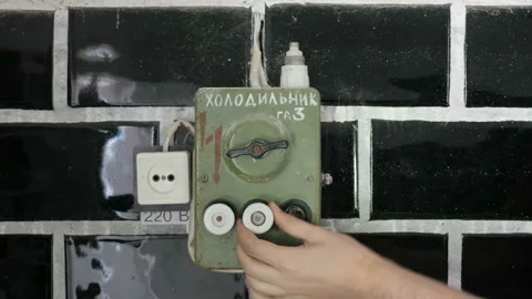 Replacing outdated ceramic fuse on old s... | Stock Video | Pond5