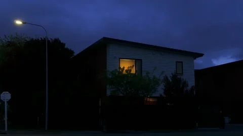 A residential building with lights on an... | Stock Video | Pond5