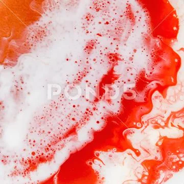 Photograph: Resin art with bright red colors. Epoxy effect background ...