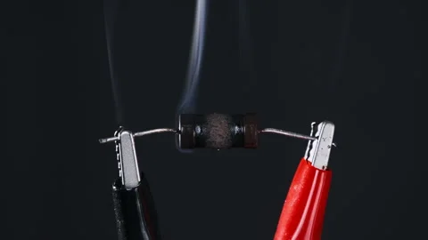 Resistor Heats Up With Smoke Under a Hig... | Stock Video | Pond5