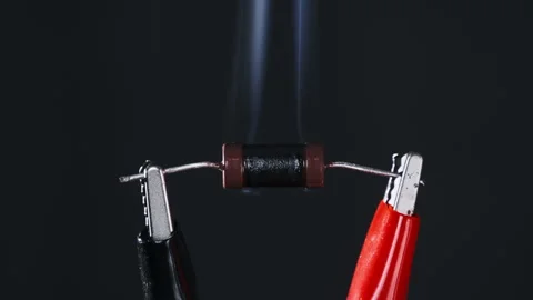 The Resistor Heats Up With Smoke Under a... | Stock Video | Pond5