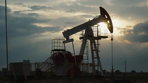 Resource extraction, an oil rig in the f... | Stock Video | Pond5