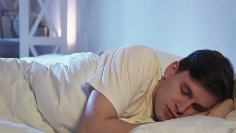 restless sleep bad dream disturbed guy b... | Stock Video | Pond5