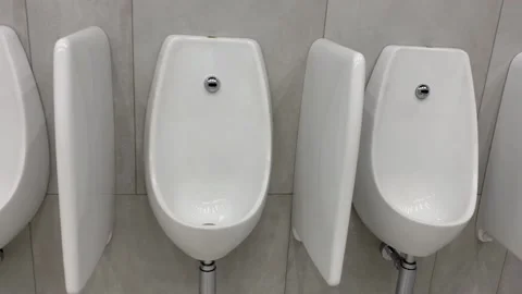 Restroom interior row urinals inside pub... | Stock Video | Pond5