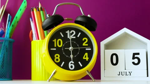 Retro alarm clock rings on a beautiful p... | Stock Video | Pond5