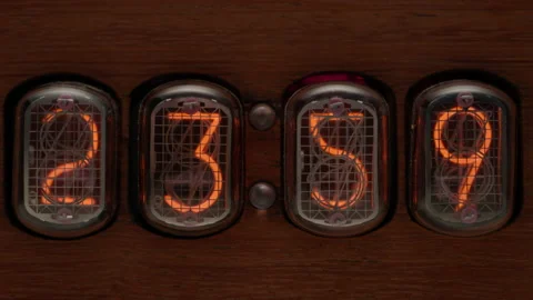 Retro clock showing 23.59 changing to 00... | Stock Video | Pond5
