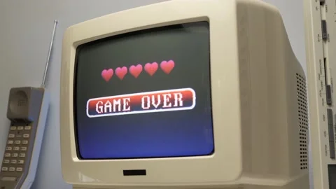 Retro GAME OVER Video Game Message on 80... | Stock Video | Pond5