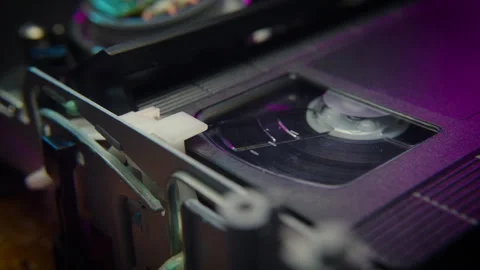 Retro Neon VHS Tape Playing in a VCR Dyn... | Stock Video | Pond5