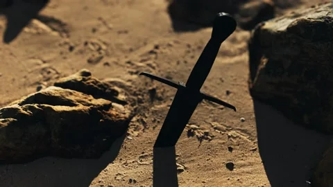 retro sword on sand beach | Stock Video | Pond5