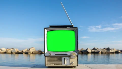 retro television on a beach next to the ... | Stock Video | Pond5