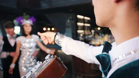 Retro theme party - a man takes a photo ... | Stock Video | Pond5