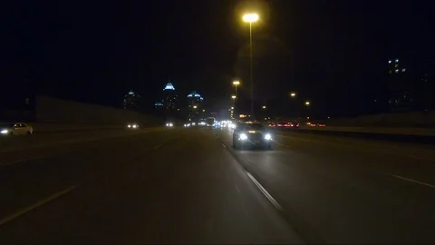 Reverse angle POV driving city streets a... | Stock Video | Pond5