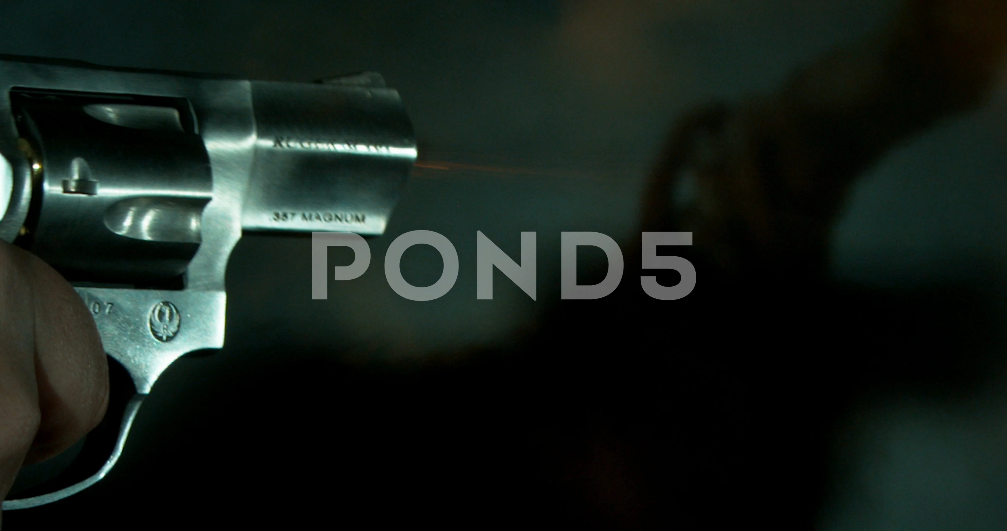 Revolver Being Fired