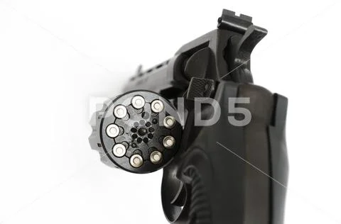 Revolver with open gun drum and isolated on a white background ...