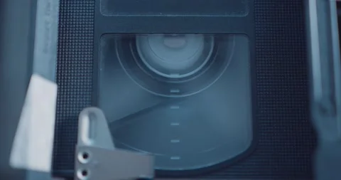 Rewinding old VHS video tape in VCR play... | Stock Video | Pond5