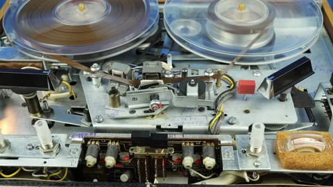 Rewinding the Reel Tape of an Old Mechan... | Stock Video | Pond5