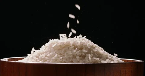 Rice being poured raw wooden cup side vi... | Stock Video | Pond5