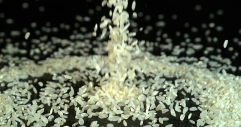 Rice falling against Black Background, S... | Stock Video | Pond5