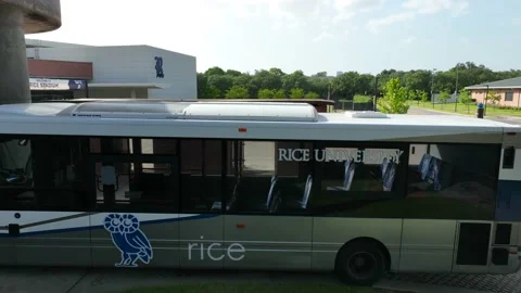 Rice Stadium. Aerial over school bus int... | Stock Video | Pond5