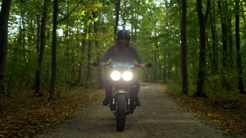 Rider in a helmet and leather jacket rid... | Stock Video | Pond5
