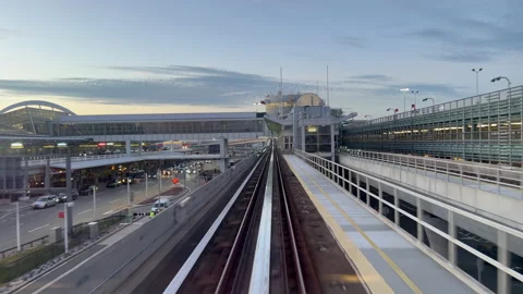 Riding airtrain in JFK airport terminal.... | Stock Video | Pond5