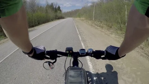 Riding a bike on the highway. First-pers... | Stock Video | Pond5