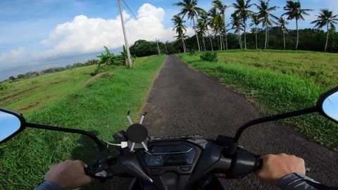 Riding a motorcycle in the first person | Stock Video | Pond5