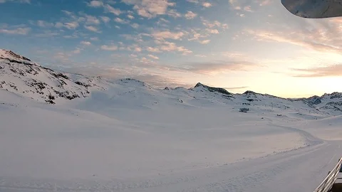 Riding a snowmobile with a trolley attac... | Stock Video | Pond5