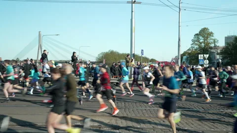 Riga Marathon 2023 crowd running on brid... | Stock Video | Pond5