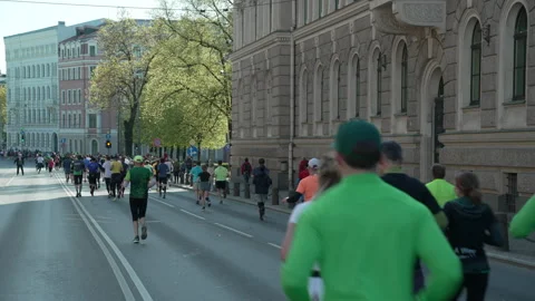 Riga Marathon 2023, runners run down fro... | Stock Video | Pond5