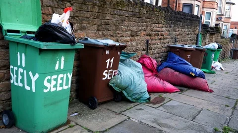Right Pan of a Street Filled with Trash ... | Stock Video | Pond5