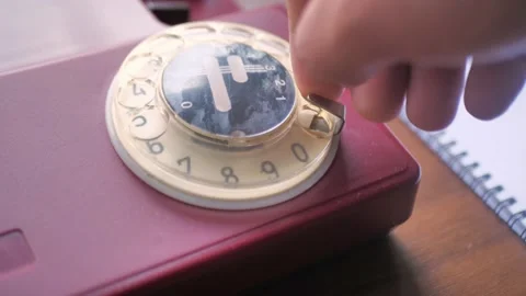 Ringing a red Rotary dial telephone. Dia... | Stock Video | Pond5