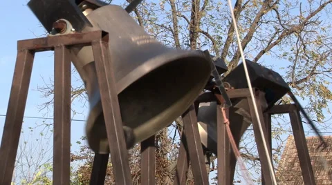 Ringing of three church bells | Stock Video | Pond5
