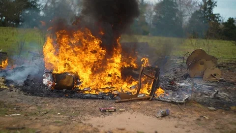 Rippling Trash Fire in a Field | Stock Video | Pond5