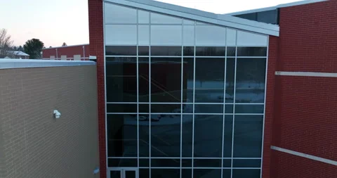 Rising aerial of modern new glass buildi... | Stock Video | Pond5