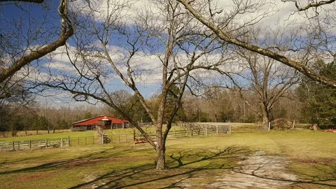 Rising aerial reveal shot of a barn at a... | Stock Video | Pond5