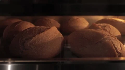 Rising and baking of white bread in bake... | Stock Video | Pond5