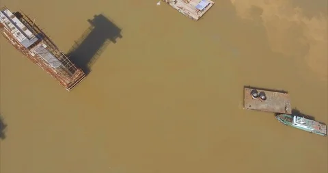 Rising up from the bridge pier cap revea... | Stock Video | Pond5