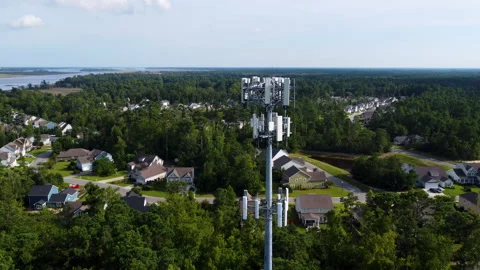 Rising Over 5G Cell Phone Tower in Neigh... | Stock Video | Pond5