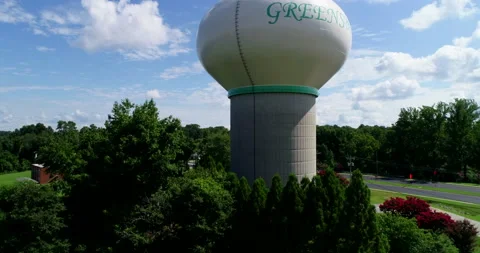 Rising over the Greensboro water tower | Stock Video | Pond5