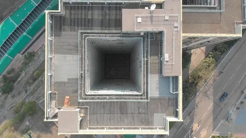 Rising up with a turn over Council Block... | Stock Video | Pond5