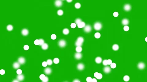 Rising white bokeh particles green scree... | Stock Video | Pond5